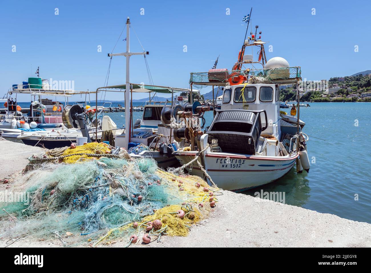 Fishing boats in port in Kanoni area of Corfu city on the island of ...
