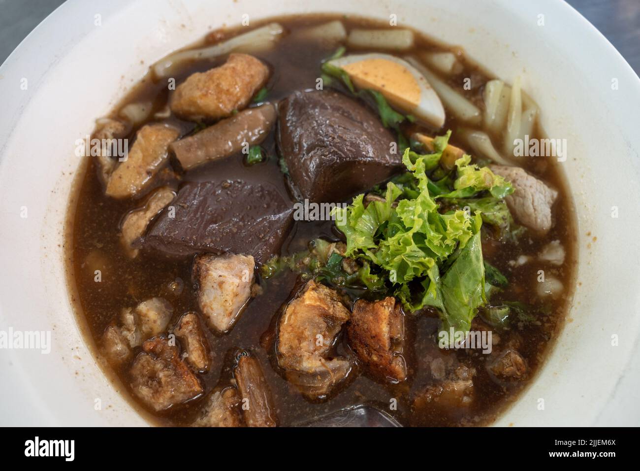 Top view, Thai style Rolled Rice Noodles in Five-spices Broth Stock ...