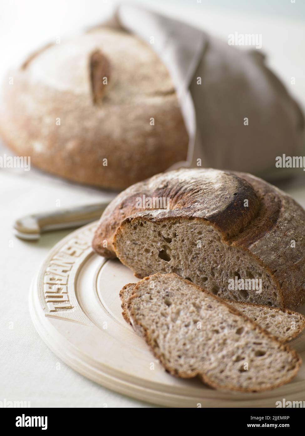 A vertical shot of cut fresh bread Stock Photo - Alamy