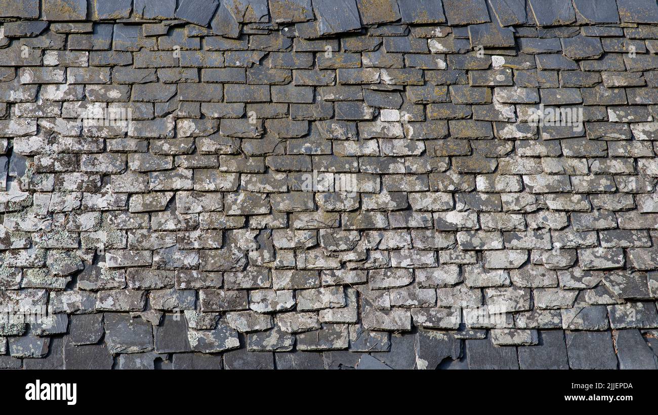 Texture of an old slate roof in the Alps in France Stock Photo - Alamy