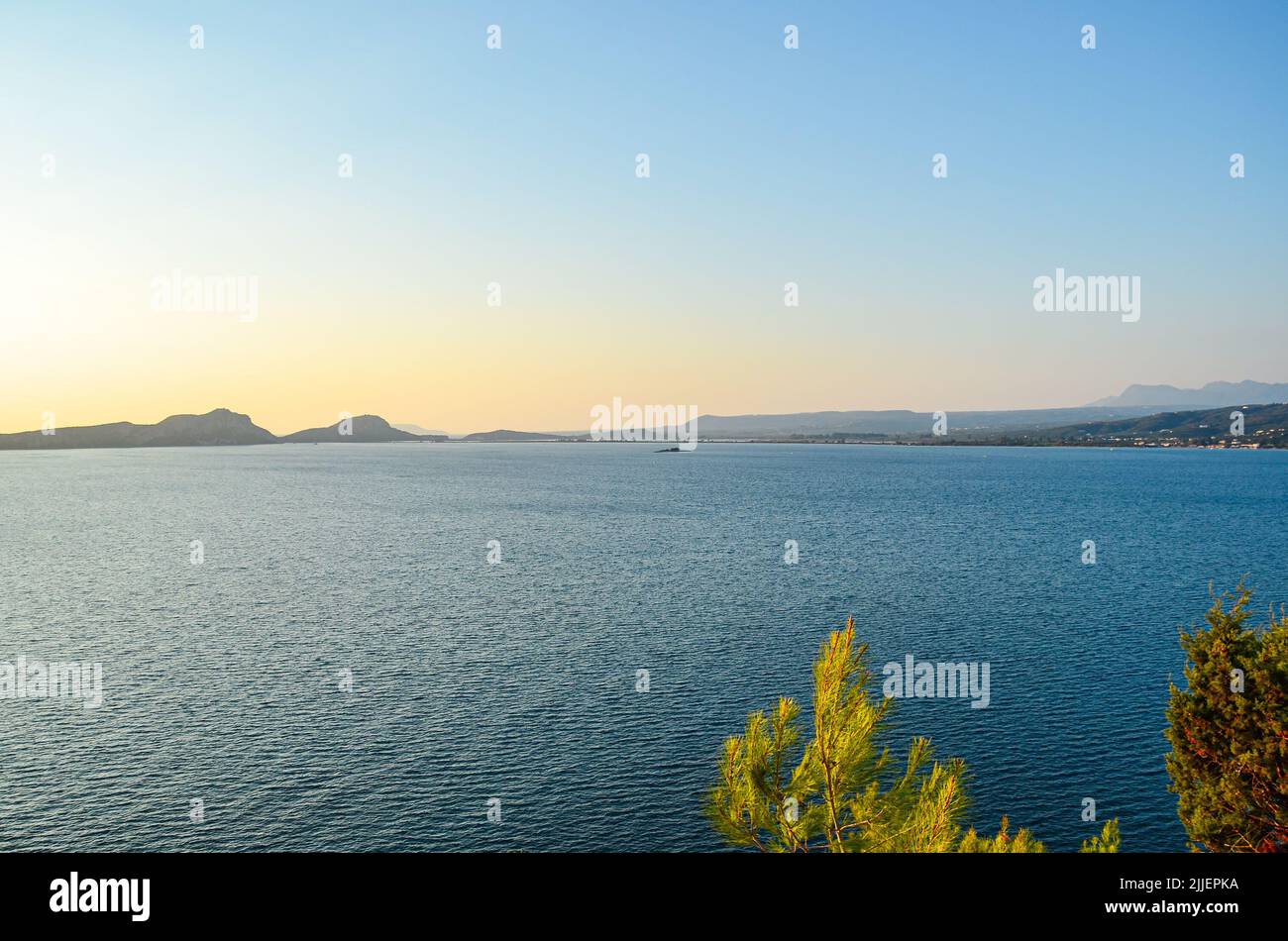 Breathtaking aerial sunset view of the famous Navarino bay and the rock ...