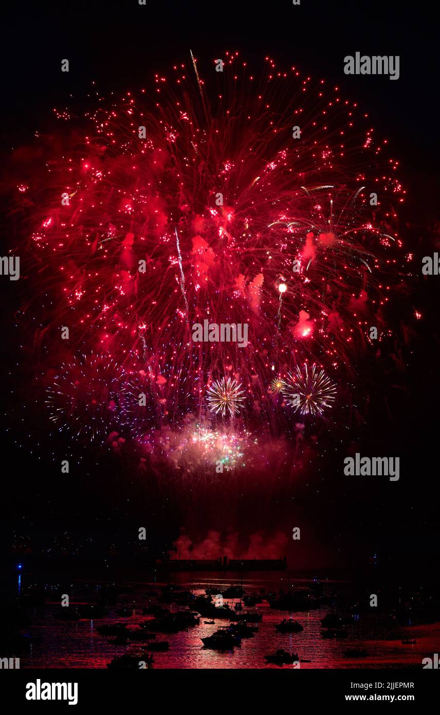 Red Fireworks over English Bay Vancouver. Summer fireworks display over ...