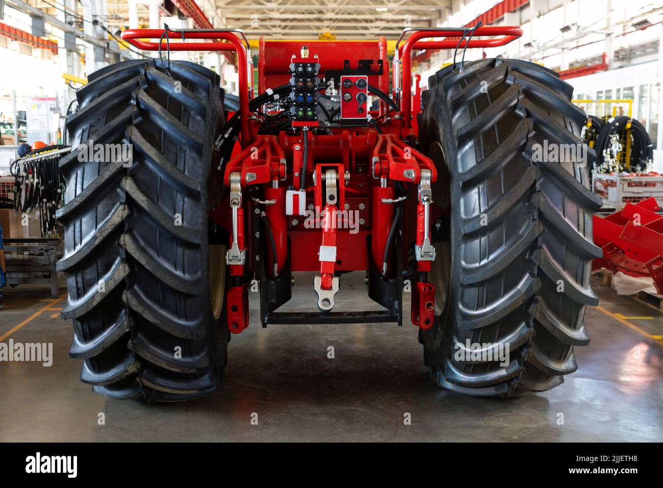 Assembly room at big industrial plant manufacturing tractors and ...