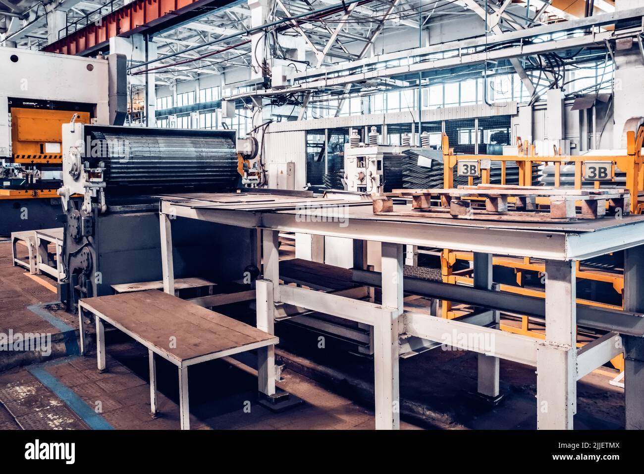 Assembly room at big industrial plant manufacturing tractors and ...