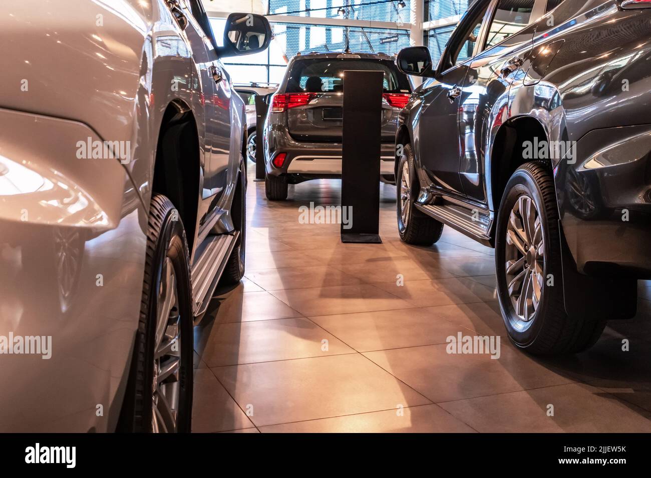 Stock of cars in showroom of automobile dealer Stock Photo - Alamy