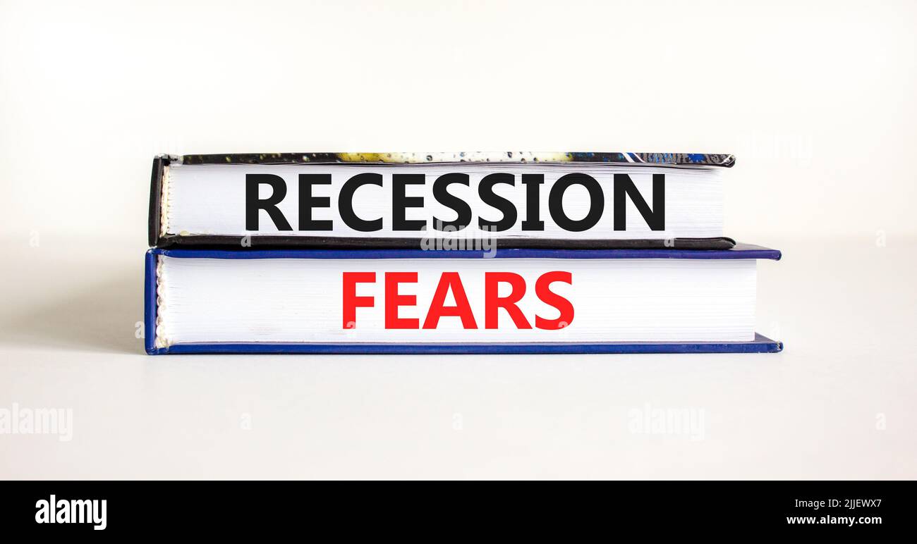 Recession fears symbol. Concept words Recession fears on books on a ...