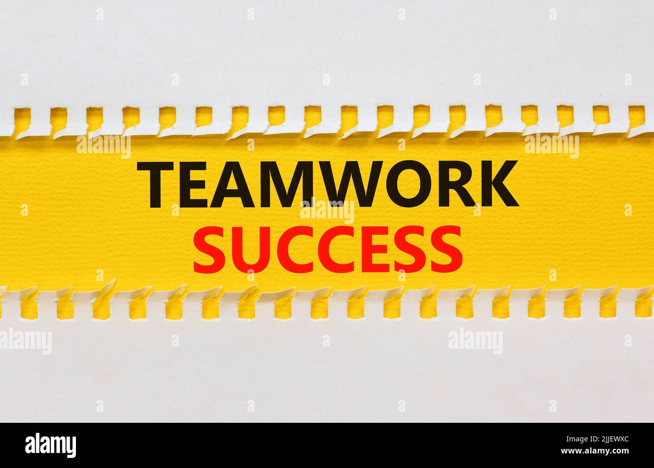 Teamwork success symbol. Concept words Teamwork success on yellow paper ...