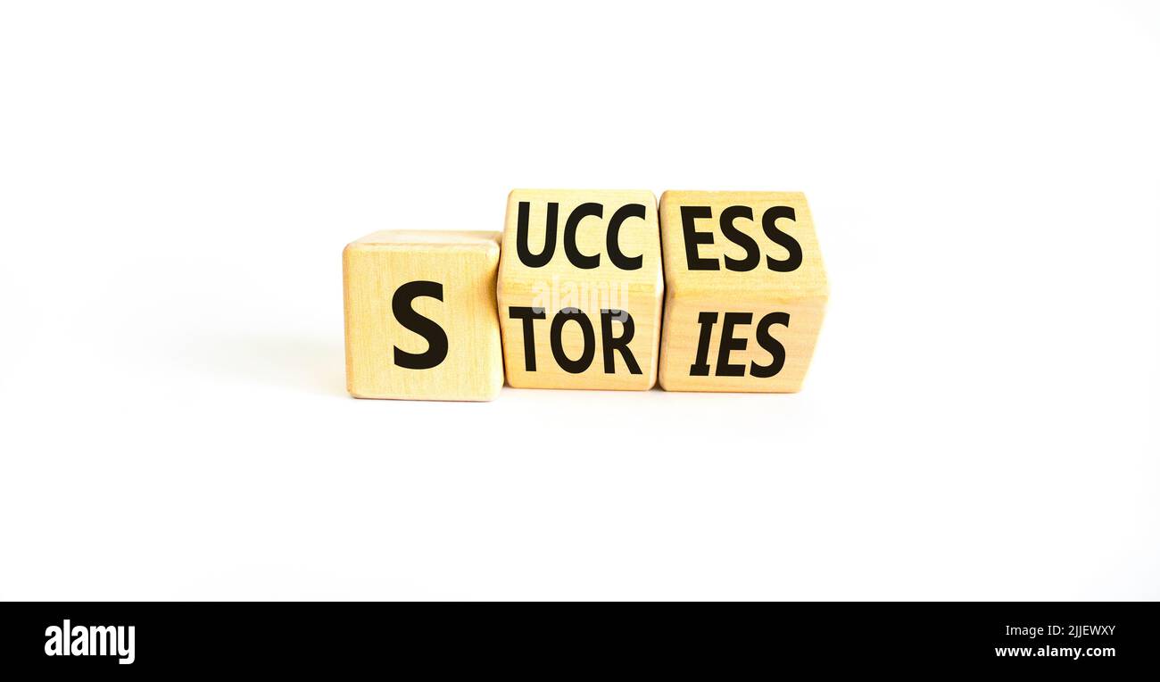 Success stories symbol. Concept words Success stories on wooden cubes ...