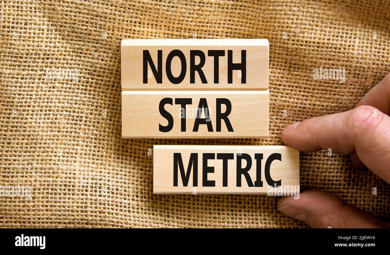 North star metric symbol. Concept words North star metric on wooden ...