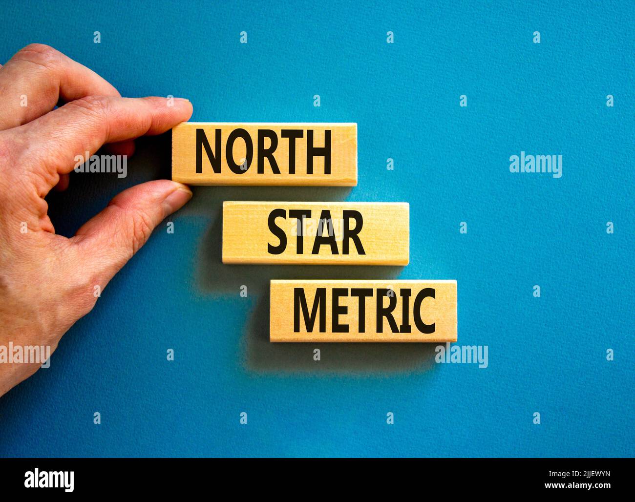 North star metric symbol. Concept words North star metric on wooden ...