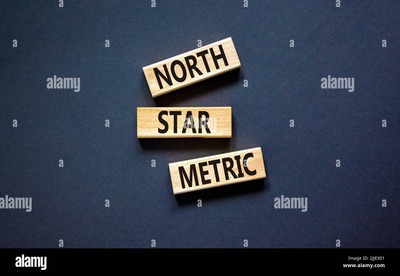 North star metric symbol. Concept words North star metric on wooden ...