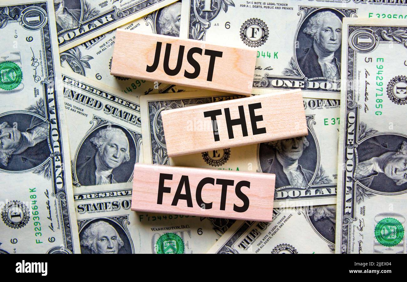 Just the facts symbol. Concept words Just the facts on wooden blocks on a beautiful background ...