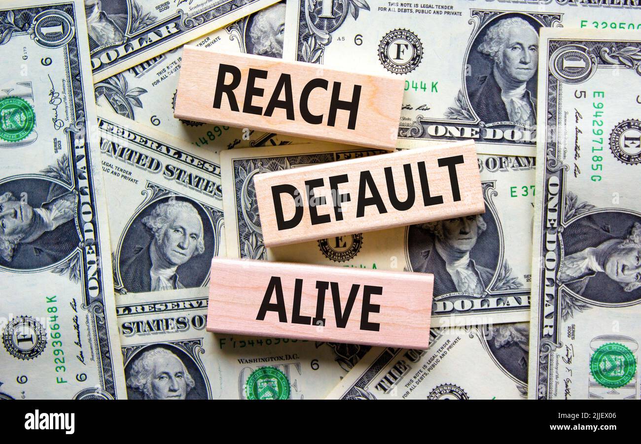 Reach default alive symbol. Concept words Reach default alive on wooden ...