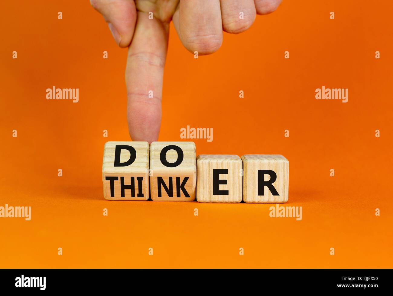Doer or thinker symbol. Concept words Doer or thinker on wooden cubes ...