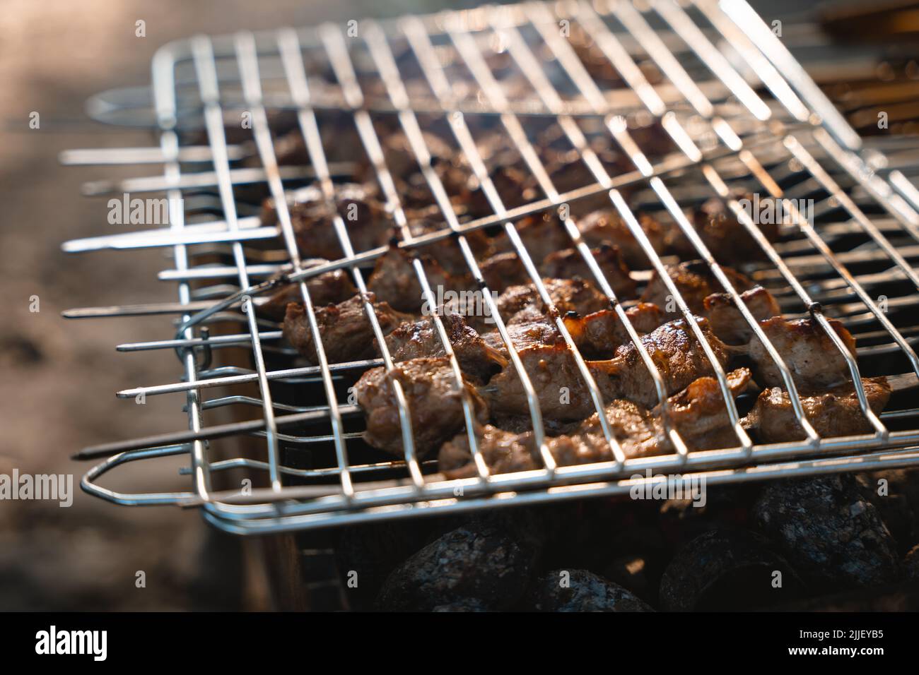 Meat kebab on grill grate hi-res stock photography and images - Alamy