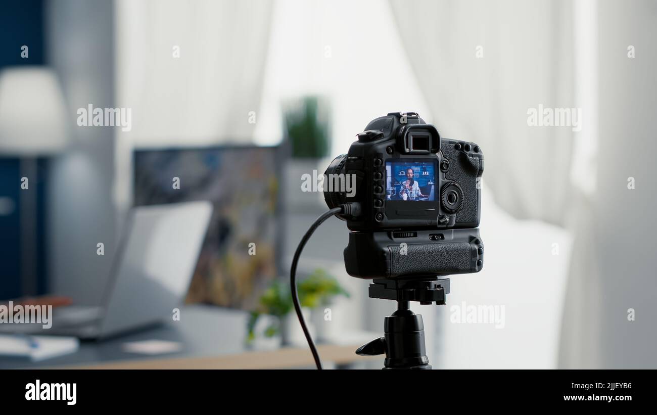 Camera filming digital content creator speaking to public. Famous ...