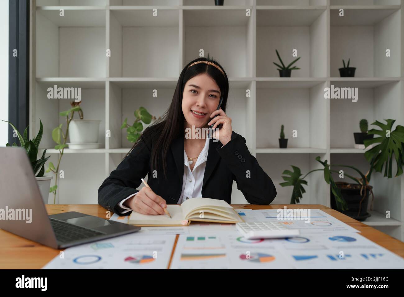 Portrait of Business woman or accountant or banker audit and analysis ...