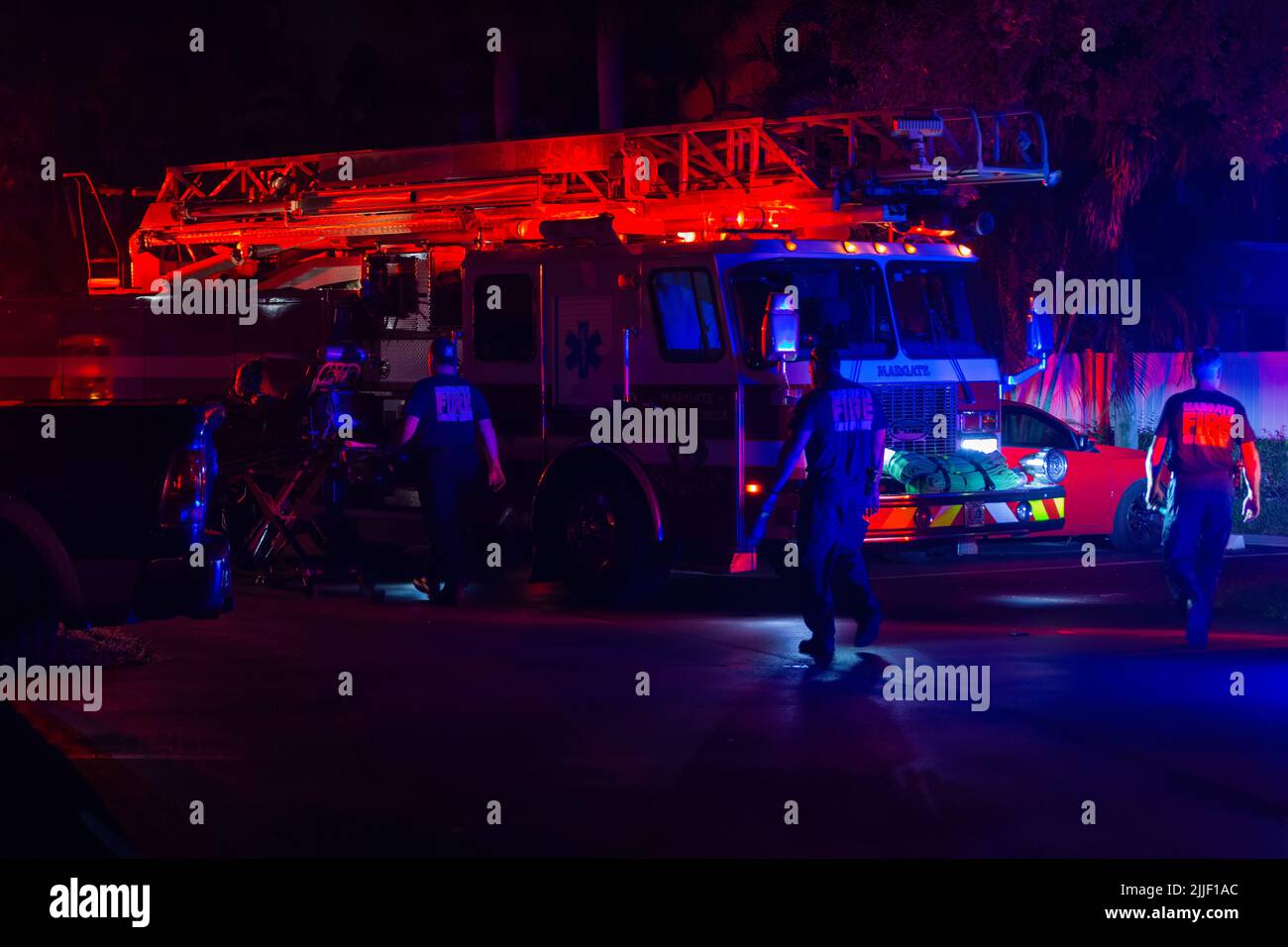 Night accident, fire and police department on duty at night time. Heavy ...