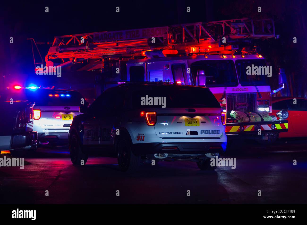 Night accident, fire and police department on duty at night time. Heavy ...