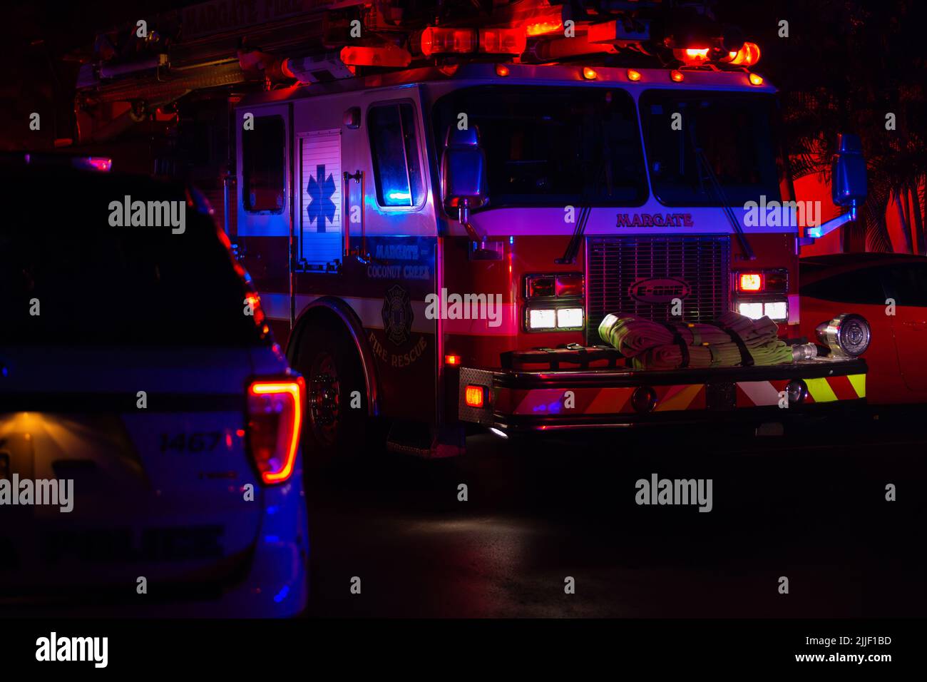 Night accident, fire and police department on duty at night time. Heavy ...