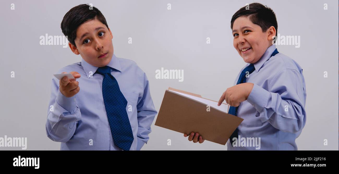 Pair of scenes of a kid dressed in a suit and tie handing over a ...