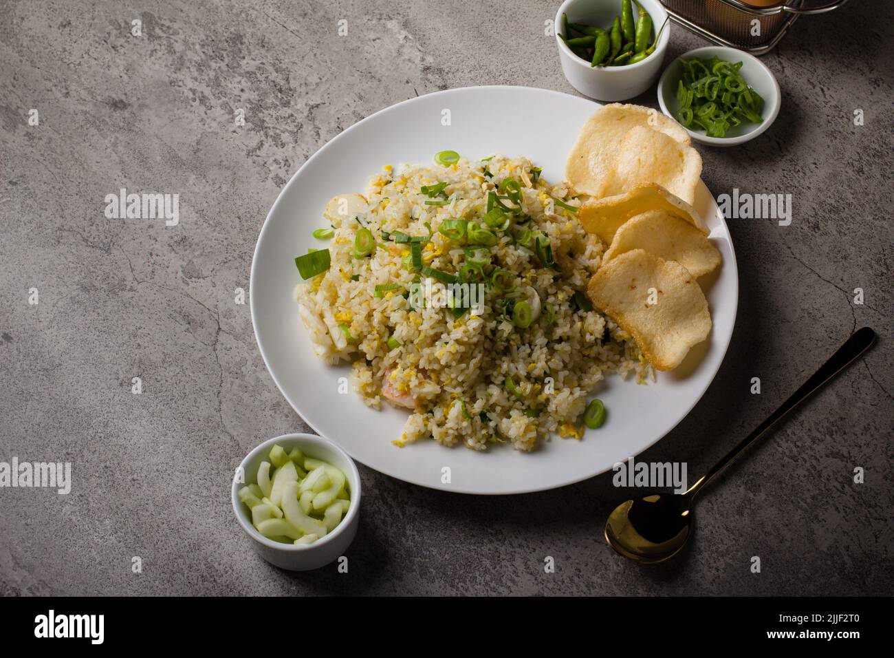 Fried rice or nasi goreng kampung, with scrambled egg, spring onion and ...