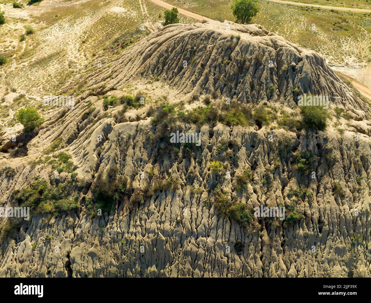 Large pile of dirt from Rubyvale underground sapphire mines in Central ...