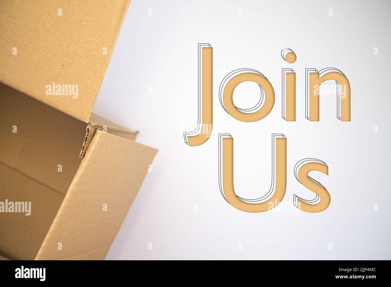 Join Us word with cardboard box. Brown folded cardbox Stock Photo - Alamy