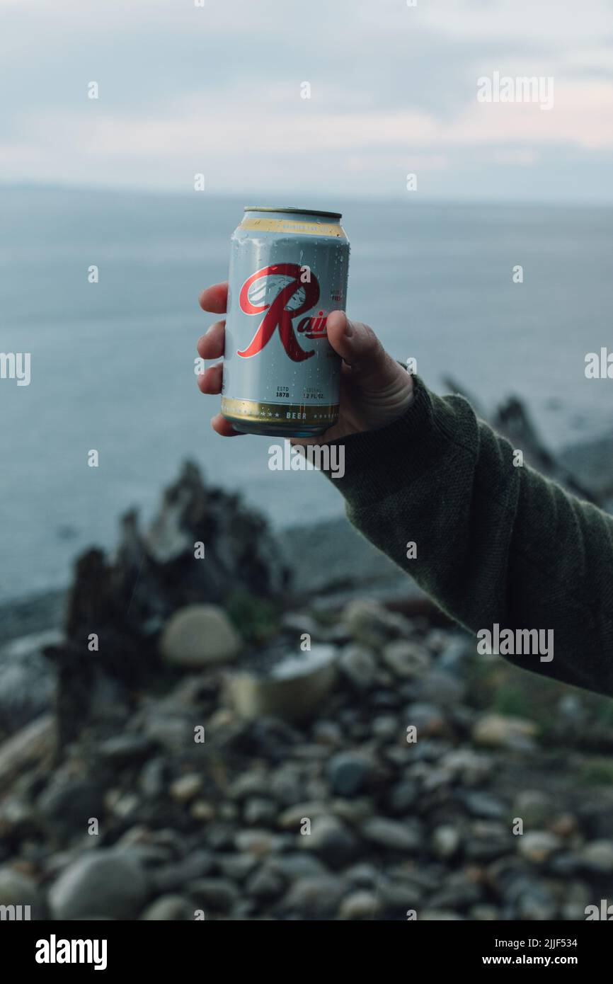 Hand holding can alcohol hi-res stock photography and images - Alamy