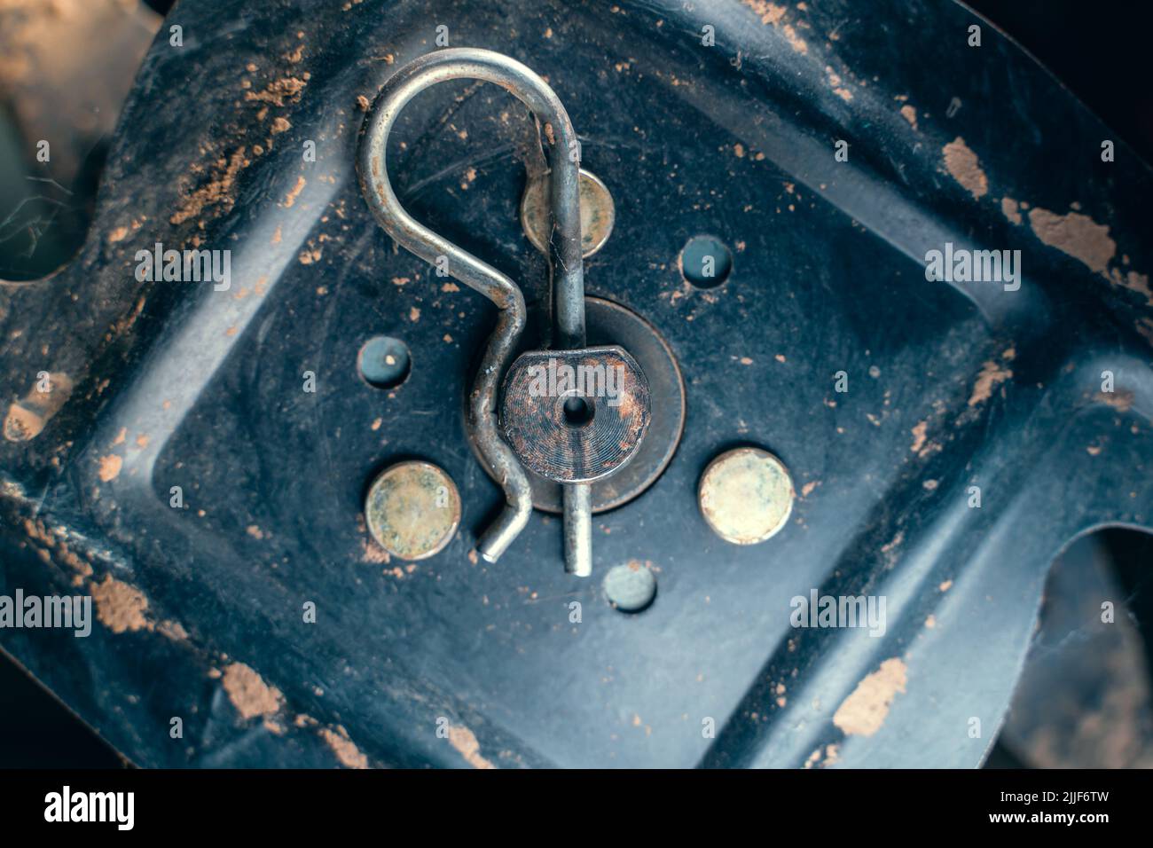 The spring cotter pin holds the axis of the tiller of the walk-behind ...