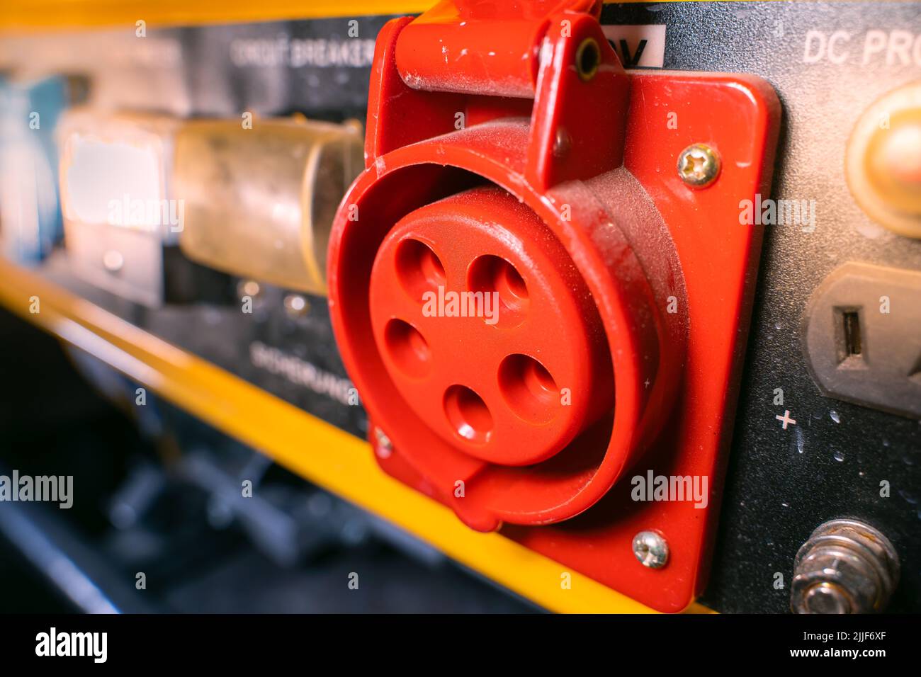Red power outlet with grounding on the gas generator Stock Photo - Alamy