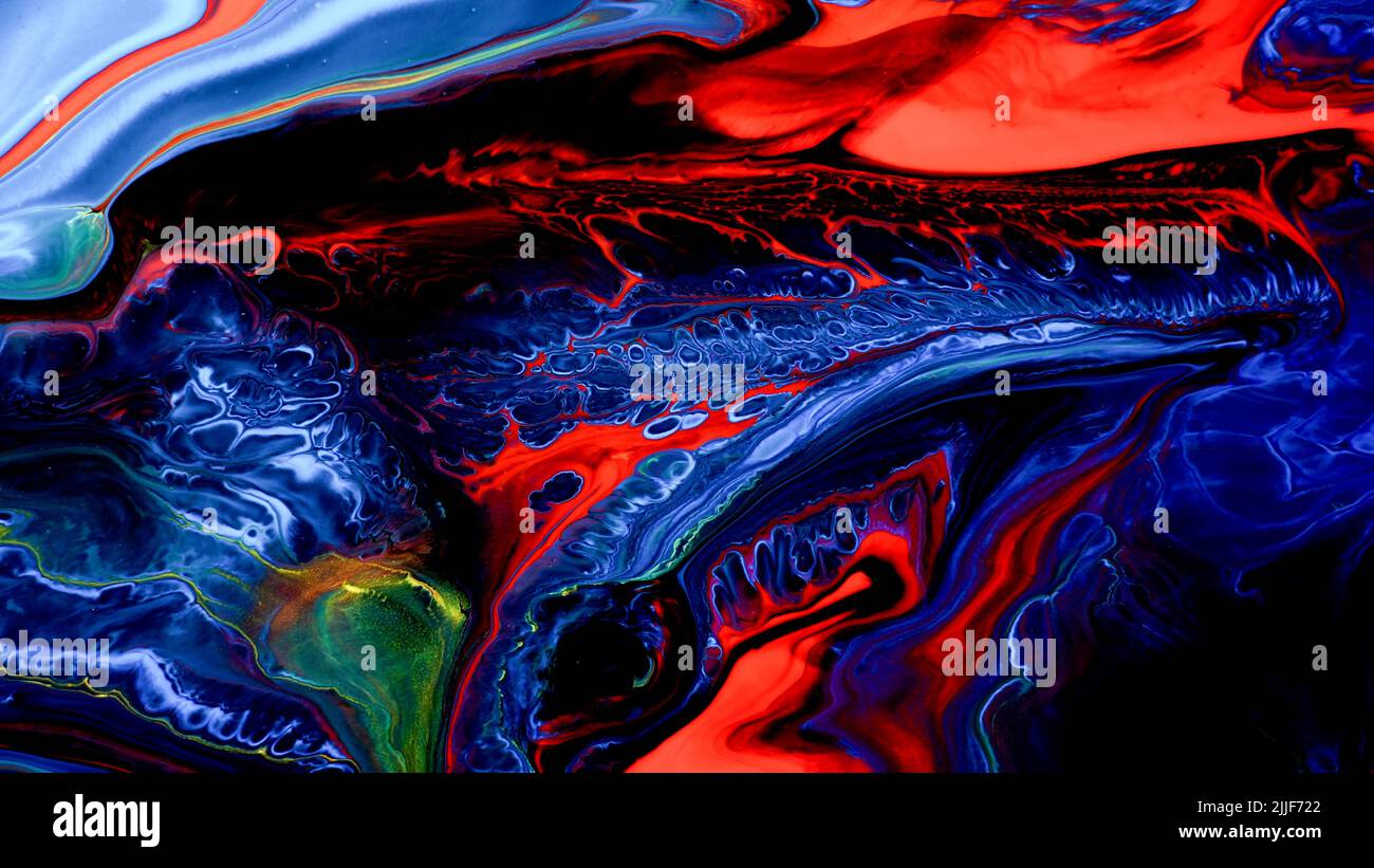 an Abstract fluid acrylic painting with mixed liquid blue and red ...