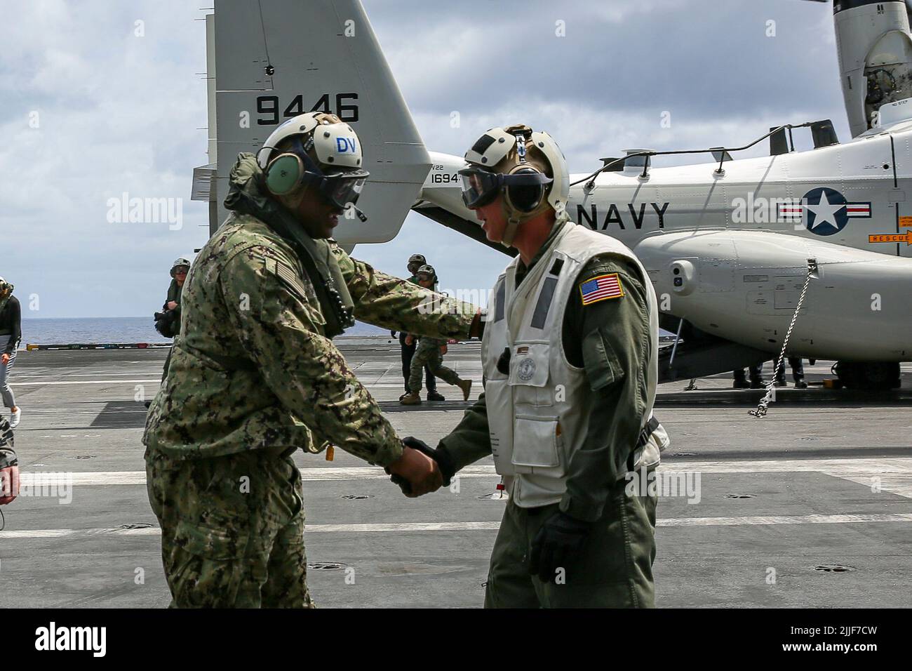 220724-N-VI910-1226 PACIFIC OCEAN (July 24, 2022) Rear Adm. J.T. Anderson, right, commander ...