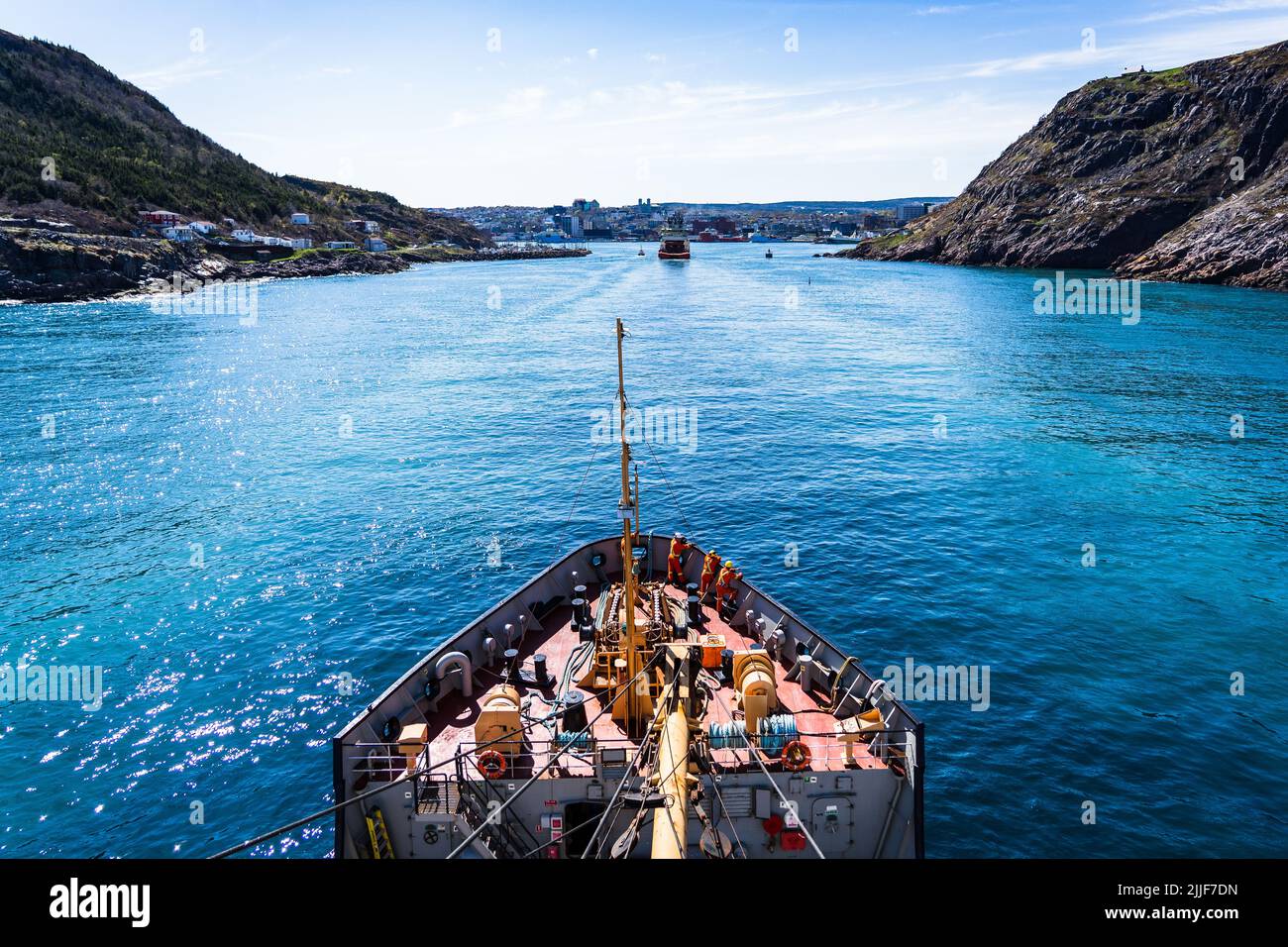 The crew of CCGS George R. Pearkes transit towards St. John's Harbour ...