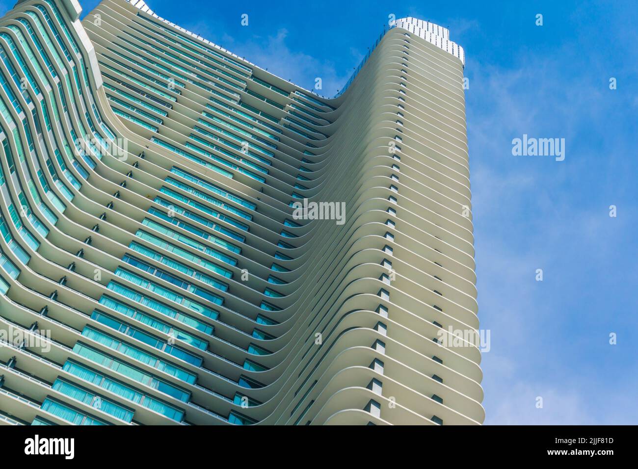 High rise skyscraper modern building against blue sky background ...