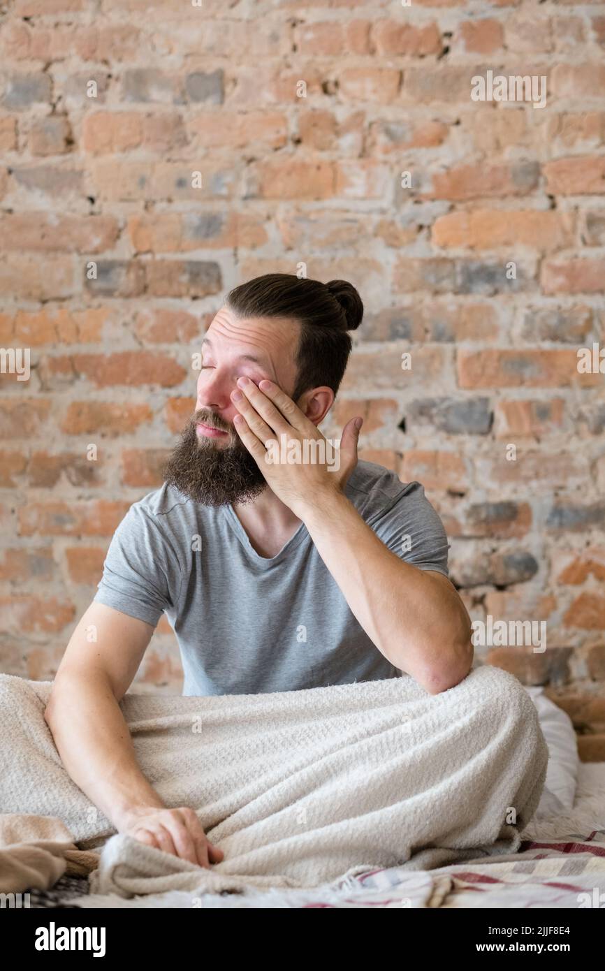 morning laziness exhaustion bad sleep drowsy man Stock Photo - Alamy
