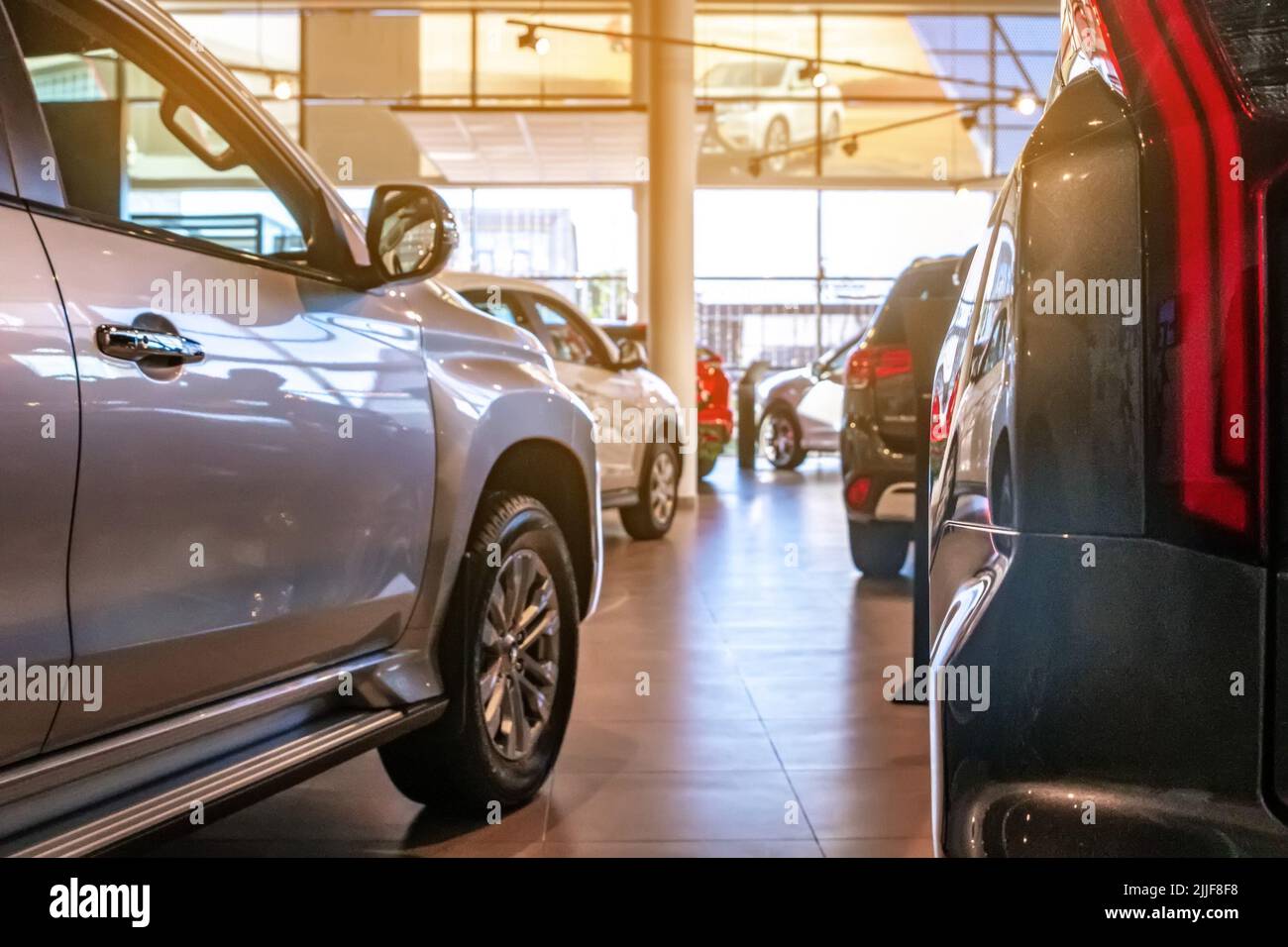 Stock of cars in showroom of automobile dealer Stock Photo - Alamy