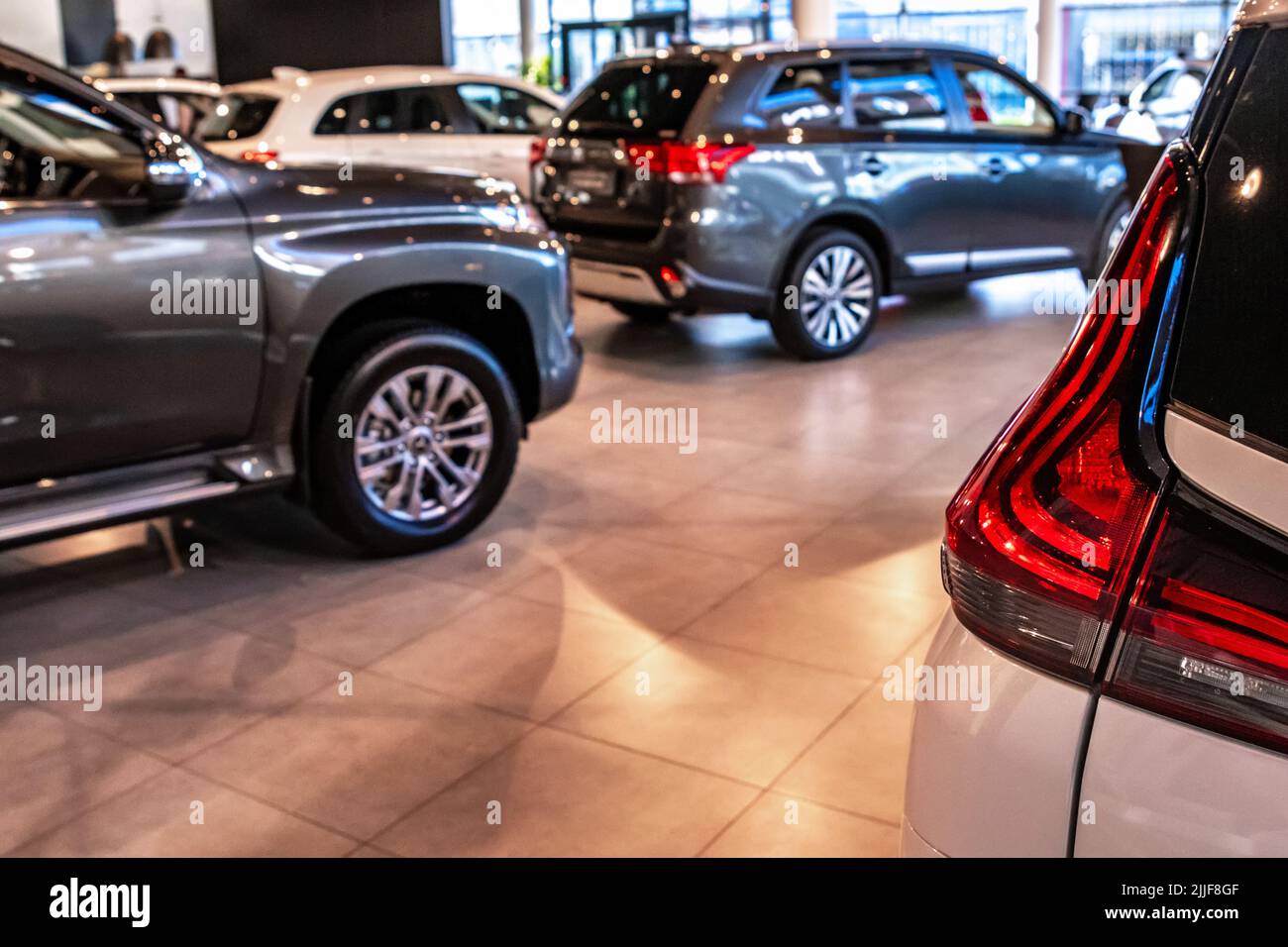 Stock of cars in showroom of automobile dealer Stock Photo - Alamy