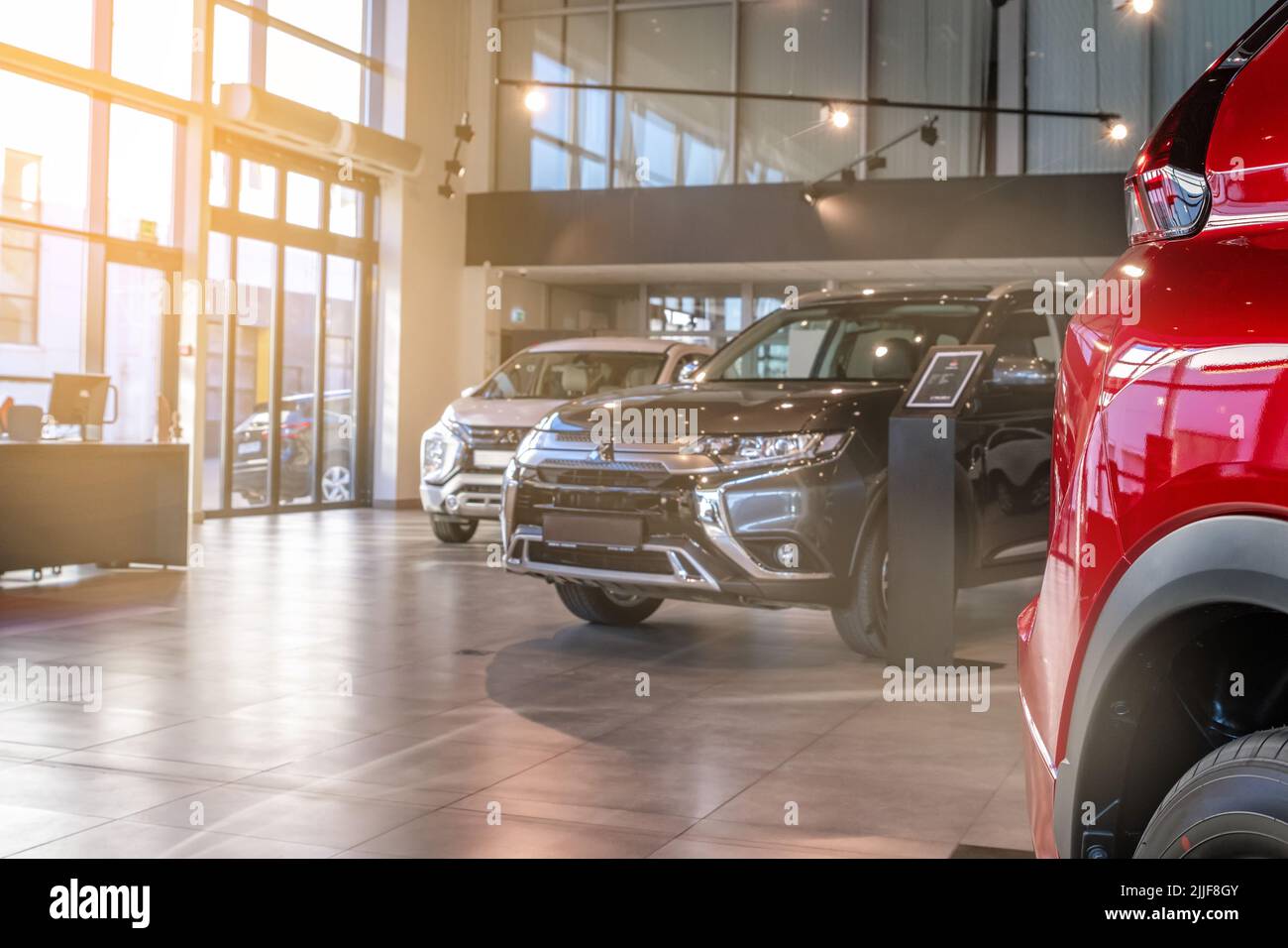 Stock of cars in showroom of automobile dealer Stock Photo - Alamy