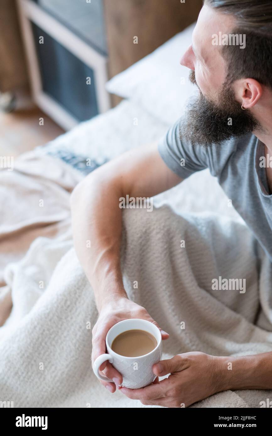 Man cup bed hi-res stock photography and images - Alamy