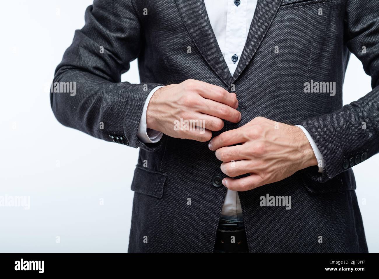 business man button jacket style corporate fashion Stock Photo - Alamy