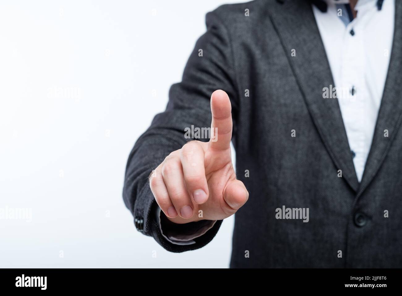 business man press index finger invisible button Stock Photo - Alamy