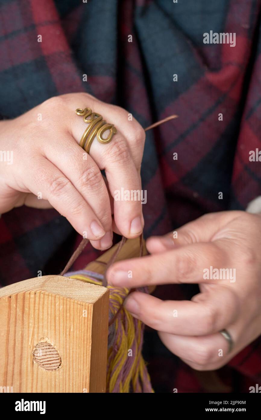 An ancient Roman woman makes yarn and sews from vintage wool ...