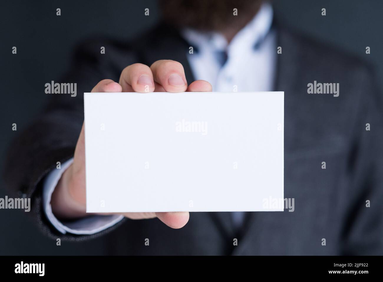man hold blank white paper information business Stock Photo - Alamy