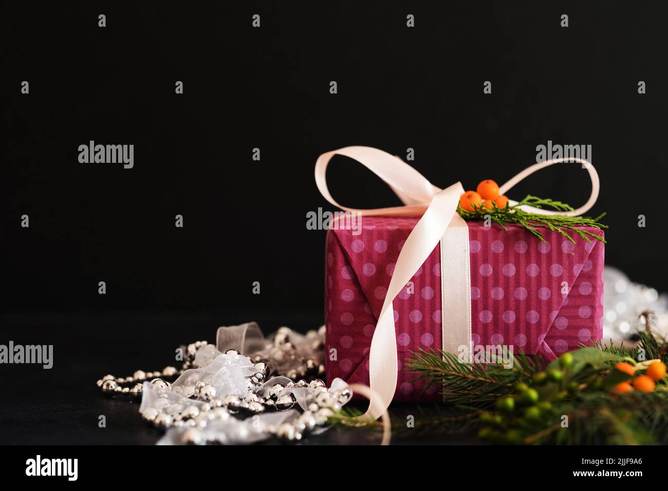 holiday celebration gift purple present fir decor Stock Photo - Alamy