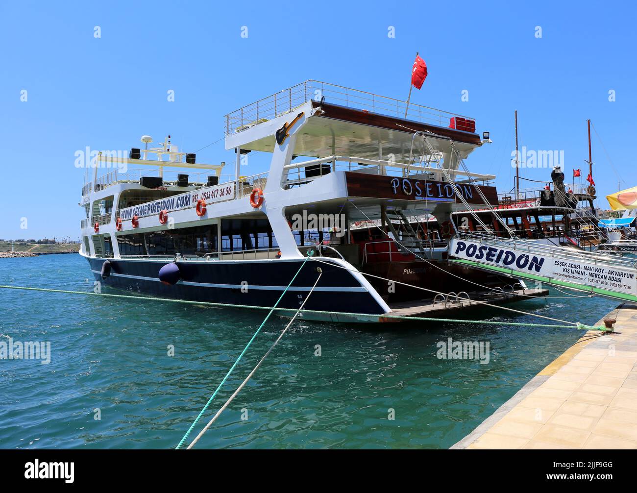 CESME,IZMIR,TURKEY-MAY 20:Tour Boat waiting for customers at Cesme Port ...