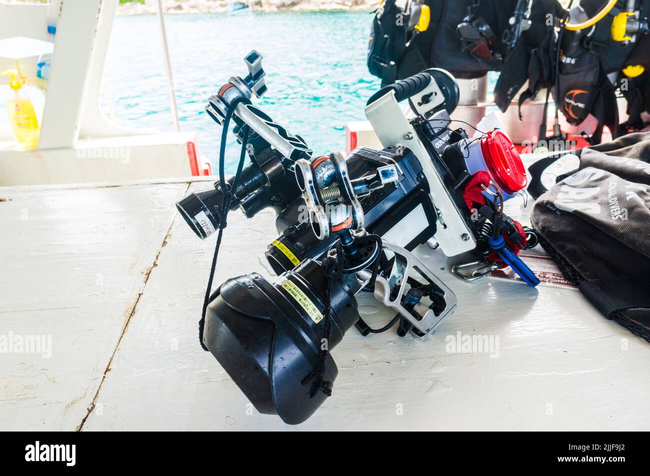 Underwater camera with scuba diving equipment on boat, Vacation object ...