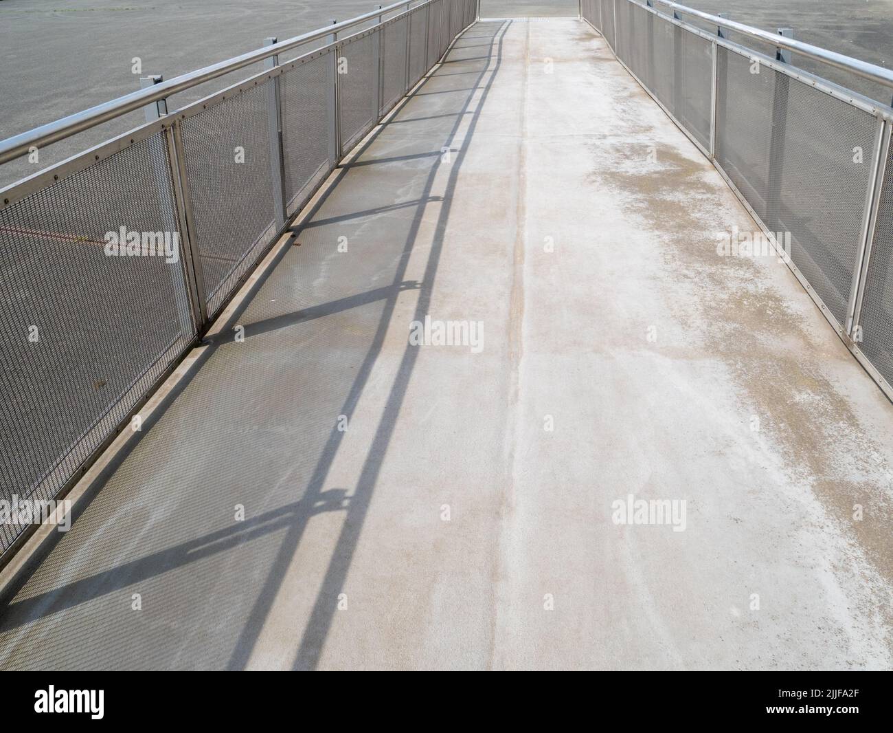 A ramp with railing for pedestrians Stock Photo - Alamy