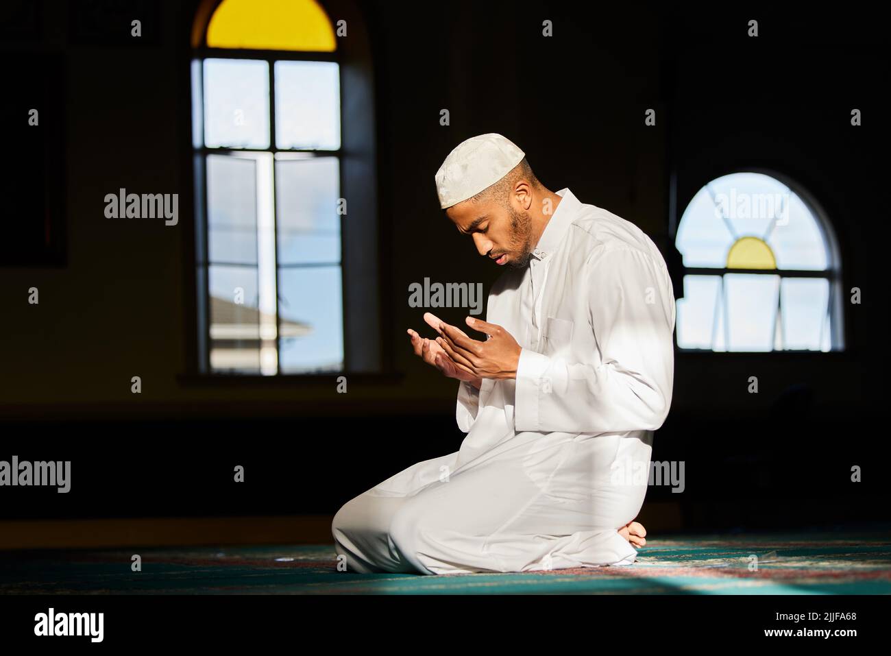 Every one of us is born with a purpose. a young muslim male praying in ...