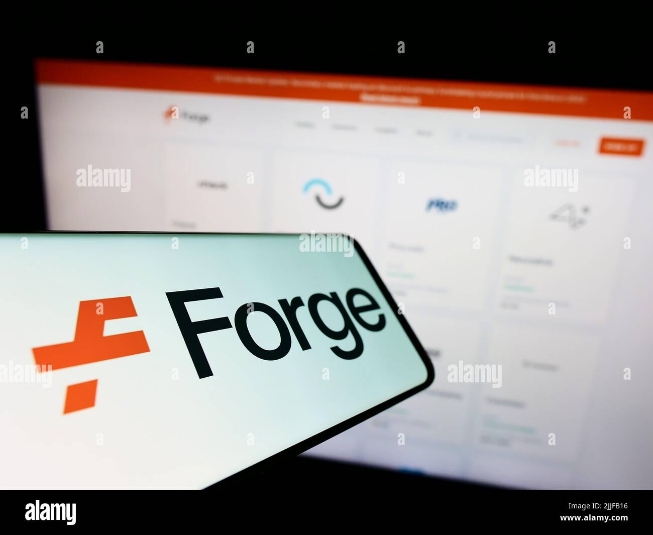 Cellphone with logo of American financial company Forge Global Inc. on ...